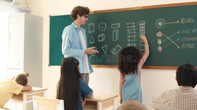 Back View of African Student Answer Question while Writing at Board ...