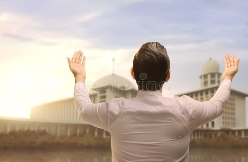 Back View of Asian Muslim Man Raising Hand and Praying Stock Image ...