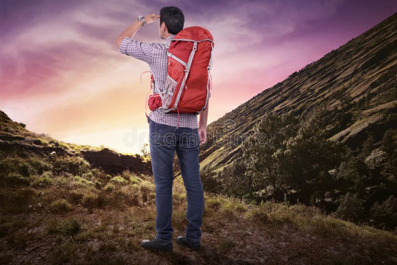 Back View of Asian Tourist Man with Backpack Looking at Scenery Stock ...