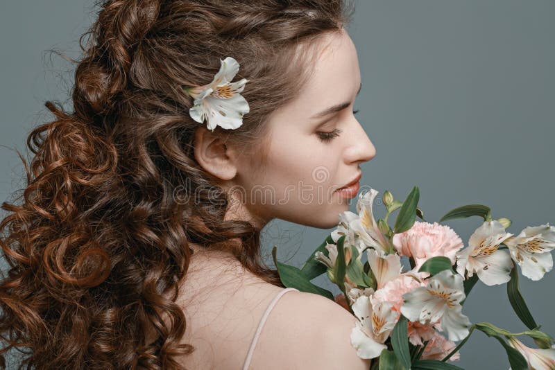 Back View of Attractive Young Woman with Spring Flowers Bouquet Stock ...