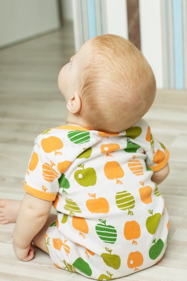 Back View of Baby Sitting and Looking Up Stock Image - Image of care ...