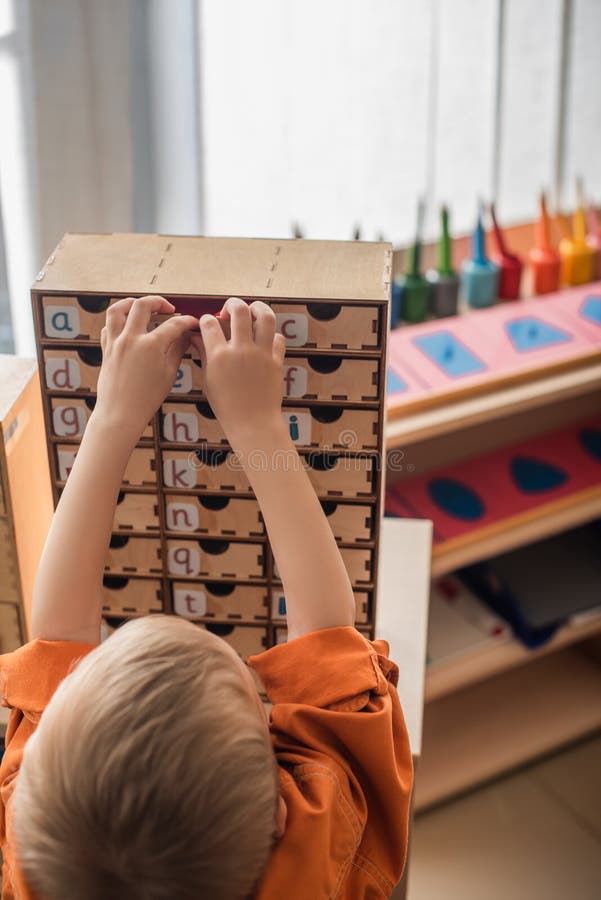 Back View of Boy Learning Alphabet Stock Image - Image of child, wooden ...