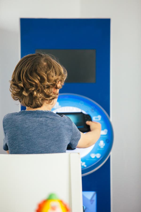 Back View of Boy Playing Game Stock Image - Image of view, childhood ...