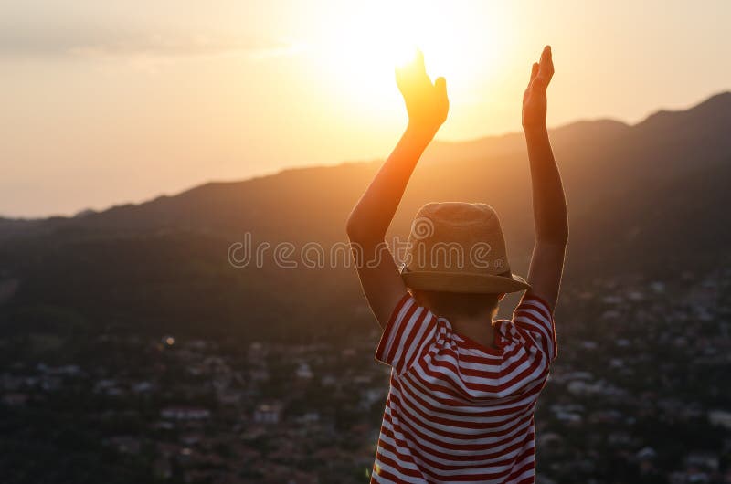 Back View, Boy Raised His Hands To Meet the Sun. Kid on Sunset ...