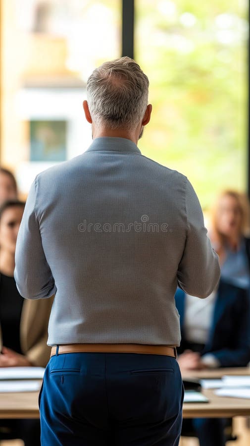 Back View of a Business Coach, in Front of a Group of 5-6 People, Stock ...