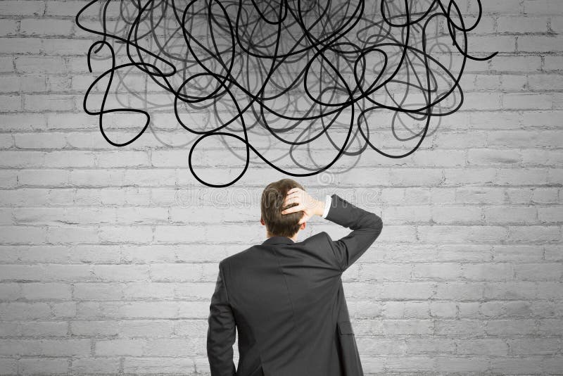 Back View of Businessman Looking at Abstract Scribble on Wall ...