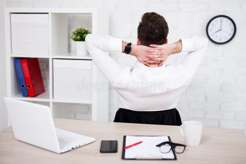 Back View of Businessman Relaxing in Office Stock Image - Image of back ...