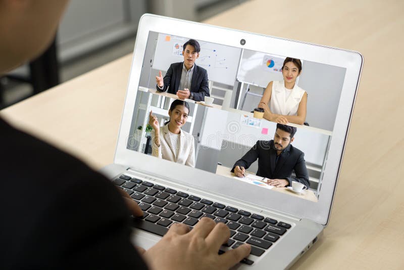 Back View of Businessman Sit at Desk in Office Typing on Laptop ...