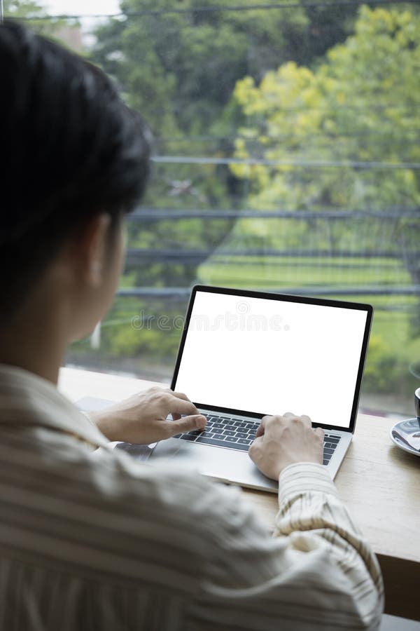 Businessman Sitting Near Window and Working with Computer Laptop. Stock ...