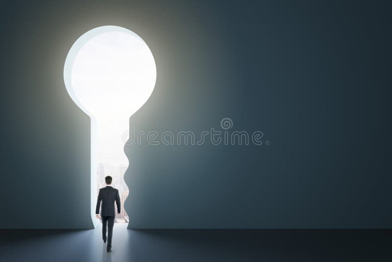 Back View Of Businessman Standing In Abstract Key Opening In Wall With