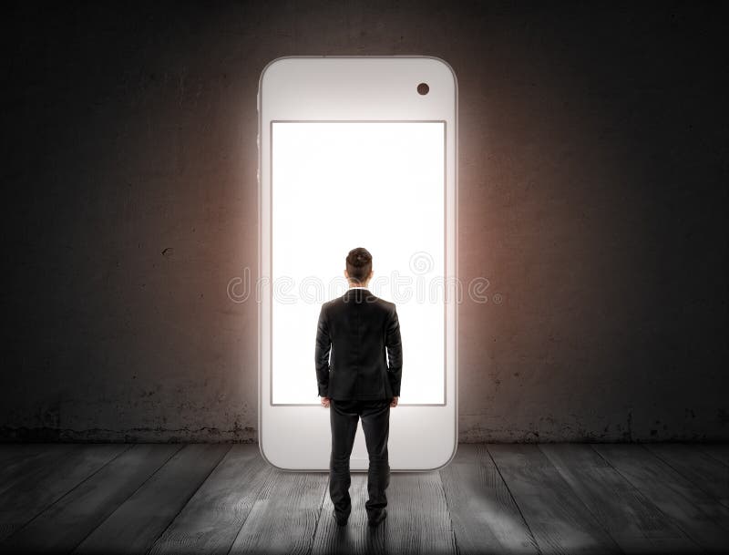 Back View of Businessman Standing Opposite Big Sized Smartphone with ...