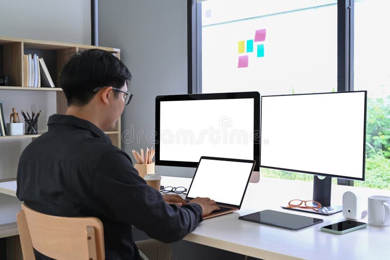 Businessman Working with Multiple Modern Gadget at Home Office. Stock ...