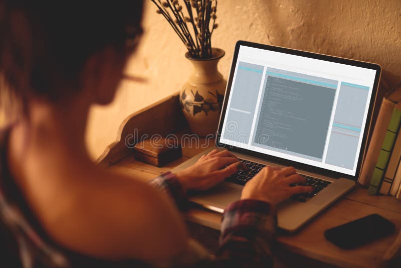 Back View of Caucasian Female Programmer Sitting at Desk, Using Laptop ...