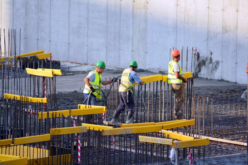 Back View of a Construction Worker Walking into a Building Site ...