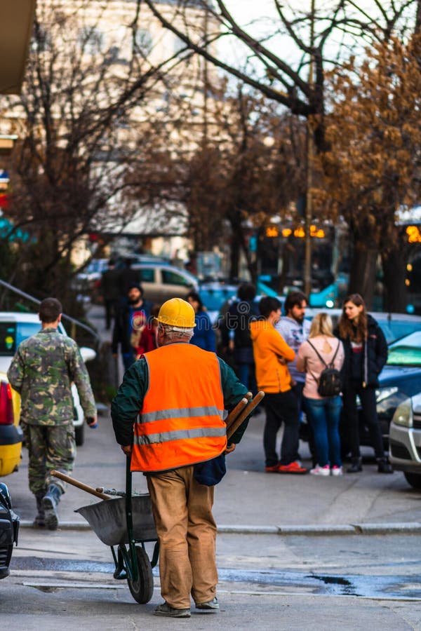 Back View of Construction Worker Wearing Reflective Vest Preparing for ...