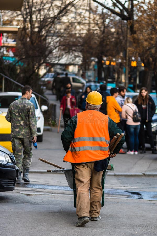 Back View of Construction Worker Wearing Reflective Vest Preparing for ...