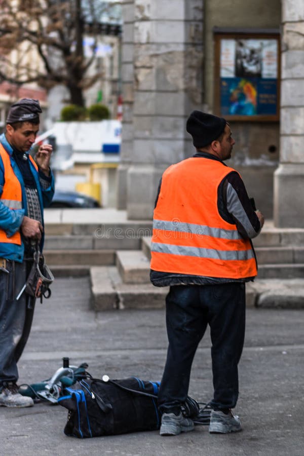 Back View of Construction Workers Wearing Reflective Vest Preparing for ...