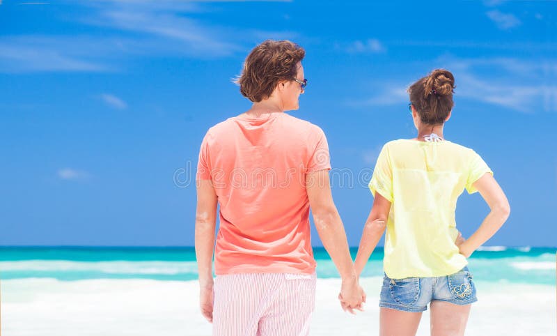 Back View of Couple in Bright Clothes on Tropical Stock Photo - Image ...