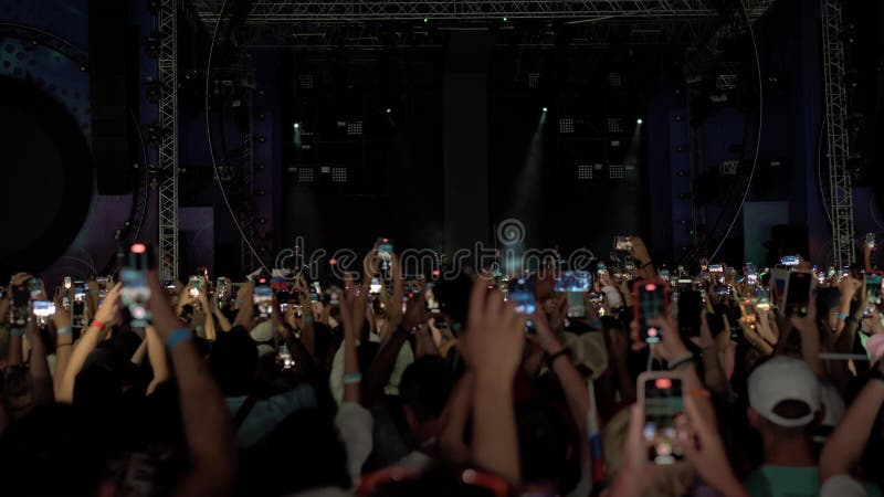 Back View of a Crowd of People at an Outdoor Concert Stock Footage ...