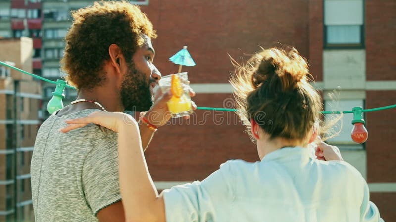 Back View of Cute Couple Having Fun at Rooftop Party Stock Footage ...
