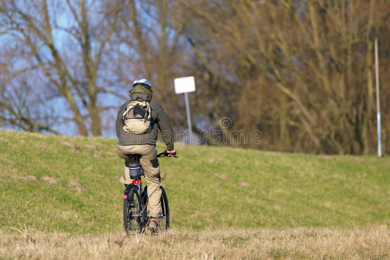 Back view of a cyclist stock photo. Image of summer - 235371266