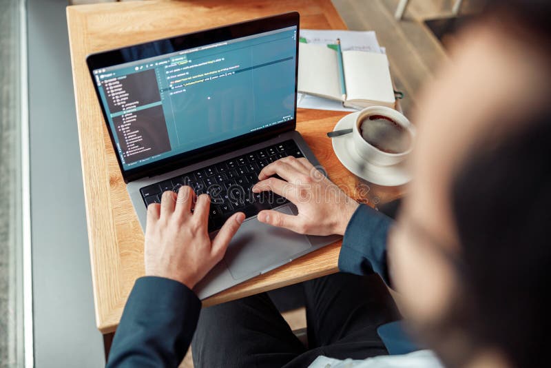 Back View of Developer Programmer Freelancer Working on Project in Cafe ... Back View of Developer Programmer Freelancer Working on Project in Cafe ...