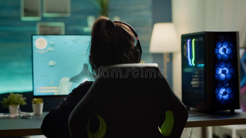 Back View of Digital Pro Player Playing Online Space Shooter Video Game ...