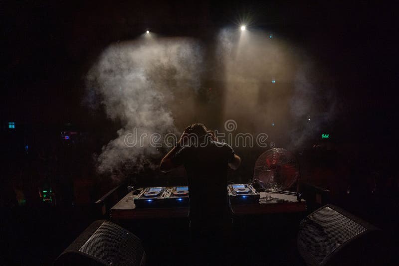 Back View of DJ on Stage during the End Party of ELCID Student ...