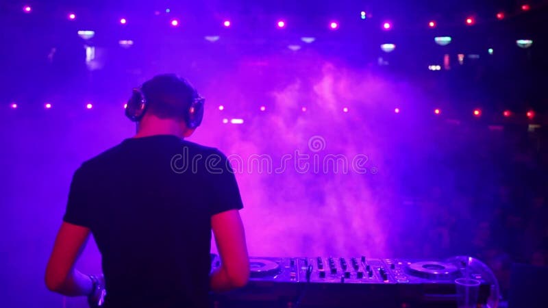 Back View of DJ is Standing on a Stage with Smoke Stock Video - Video ...