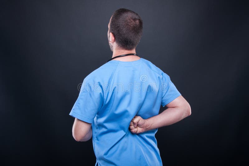 Back View Doctor Wearing Scrubs Having Spine Problem Stock Photo ...