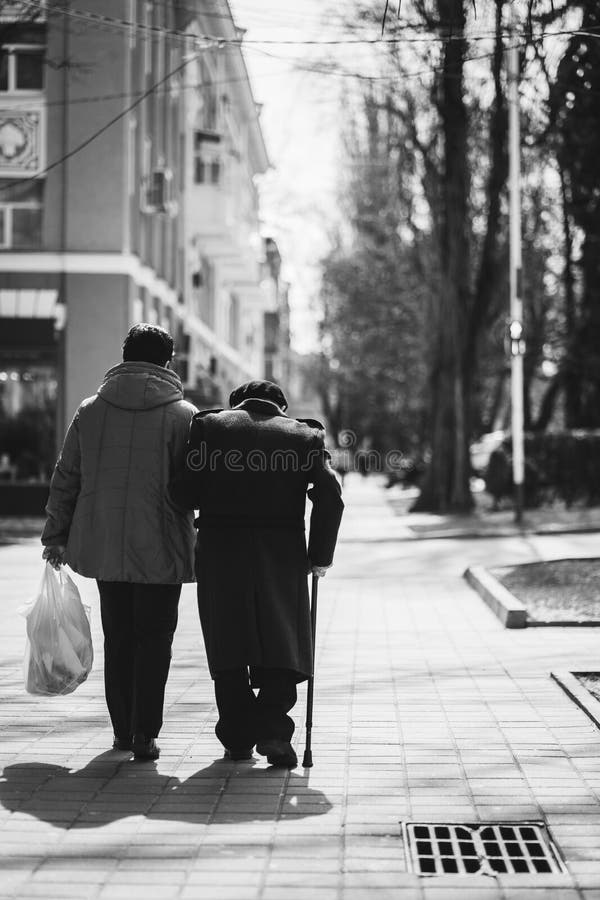 Back View of Elder Couple Walking in the Street. Editorial Photo ...