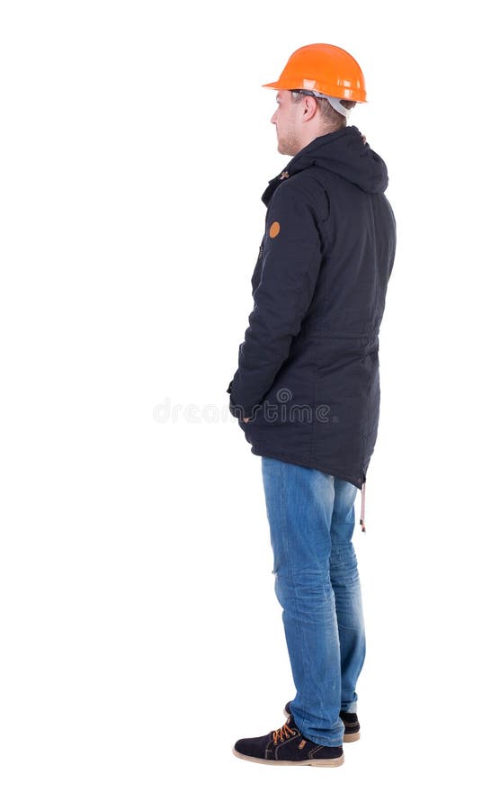 Back View of an Engineer in Construction Helmet Stands. Stock Image ...