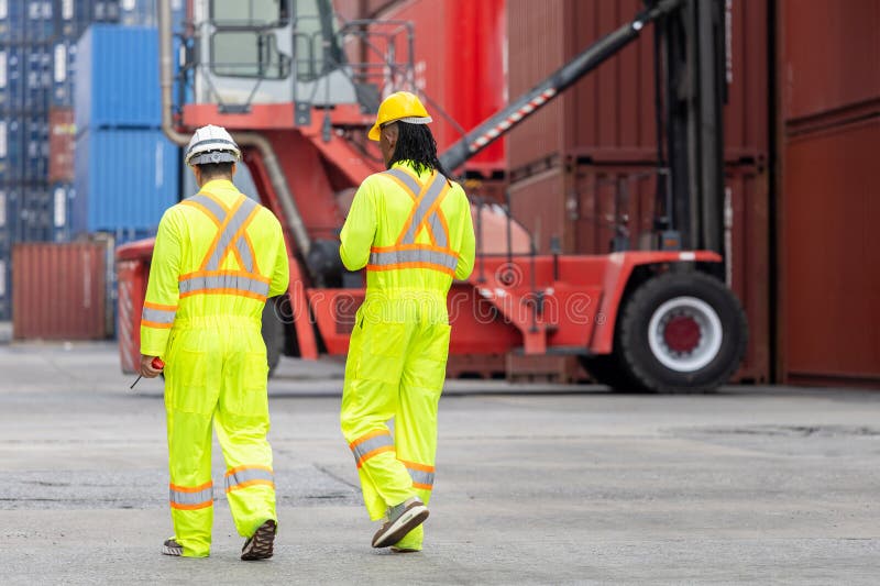 Back View of Engineer and Foreman Worker Checking Loading Containers ...