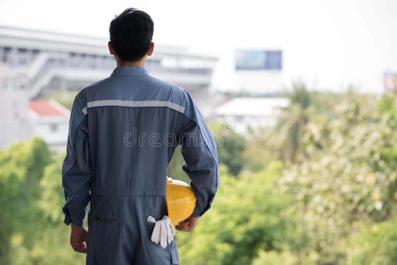Back View of Engineer Looking at Green Nature Stock Photo - Image of ...