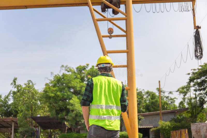 Back View of Engineer Man in Hardhats on Construction Site, Foreman ...