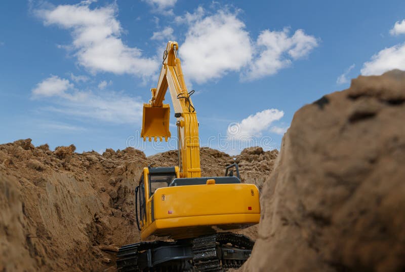 Back View of Excavator are Digging the Soil. Stock Image - Image of ...