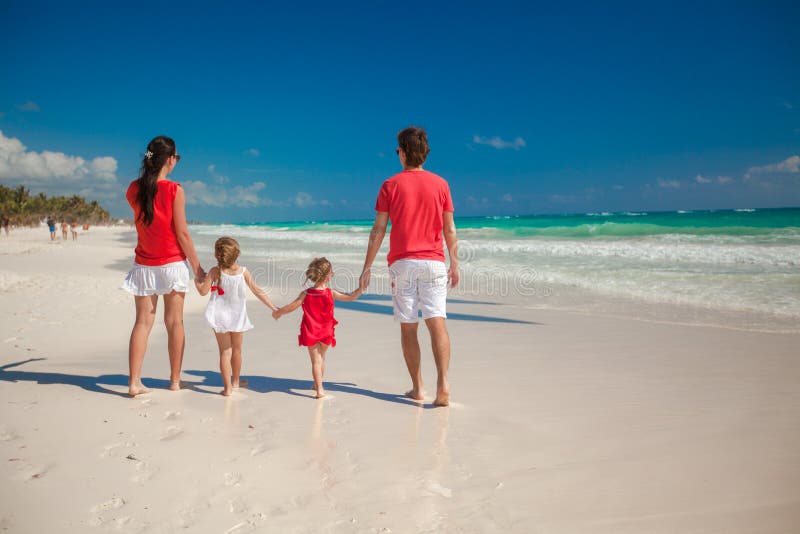 Back View Family of Four on Beach Vacation Stock Image - Image of coast ...