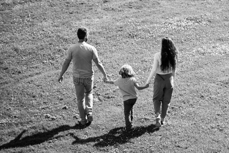 Back View of Family Spending Time Together Outside in Green Nature ...