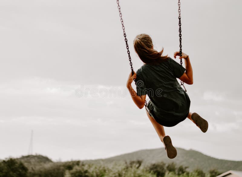Back View of a Female in the Air on a Swing Stock Photo - Image of ...