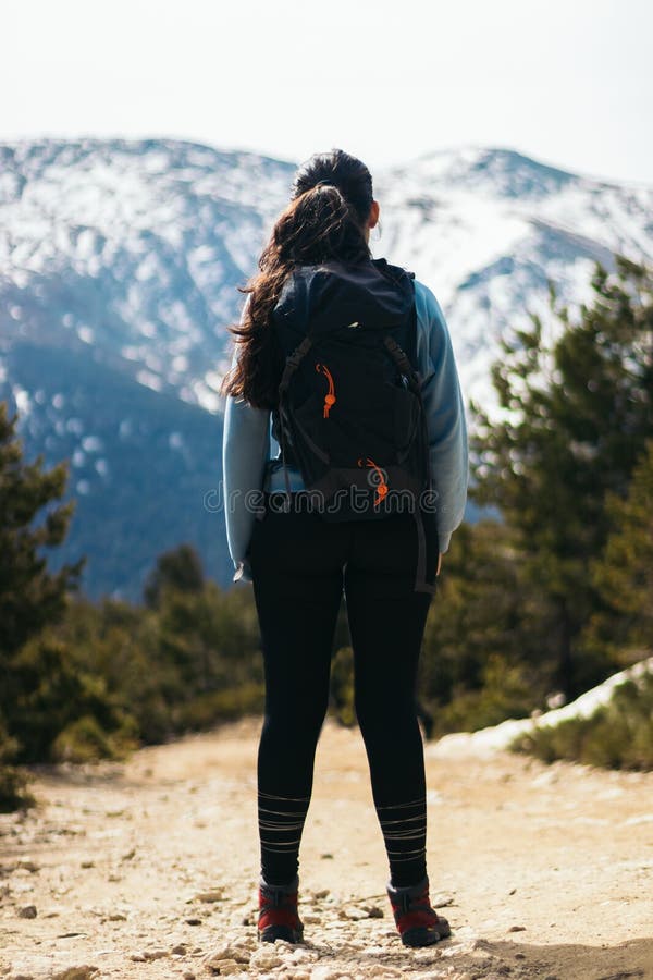 Back View of a Female Hiker in Snowy Mountains Stock Photo - Image of ...