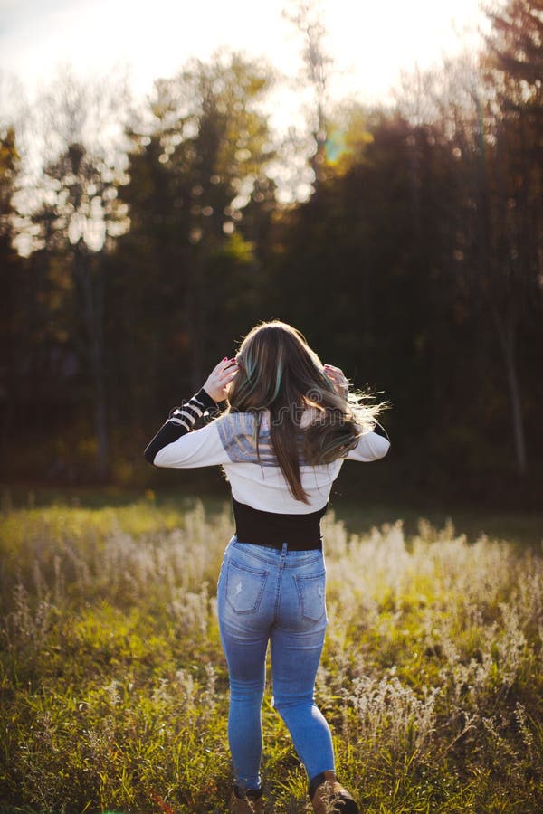 Back View of Female Standing in Greenery Field Stock Image - Image of ...
