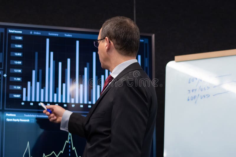 Back View of Financier Analyzing Market Reports Stock Image - Image of ...