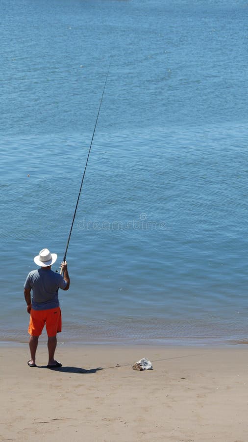 Back View of a Fishing Man on a Beach Stock Photo - Image of catching ...