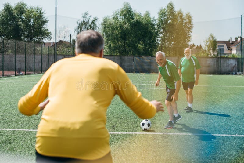 Back View of Goalkeeper and Elderly Men Stock Photo - Image of ...