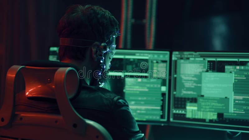 Back View of Guy Using Futuristic Headset with LED Lights Programs ...