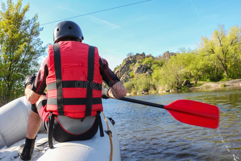 Back View of a Hand with Red Paddle Rafting on the River Stock Image ...