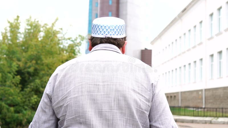 Back View of Handsome Muslim Man Who Walking in City Stock Footage ...