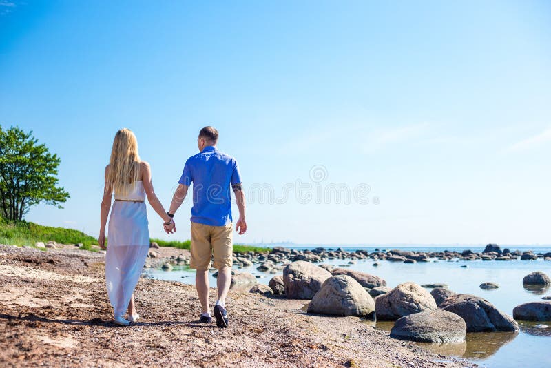 Back View of Happy Couple in Love Walking on Beach Stock Image - Image ...
