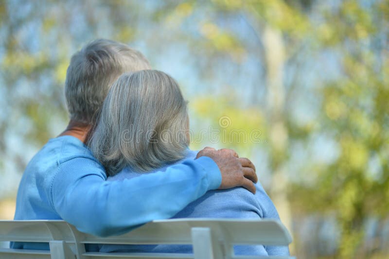 Back View. Happy Elderly Couple Sitting on Bench Stock Image - Image of ...