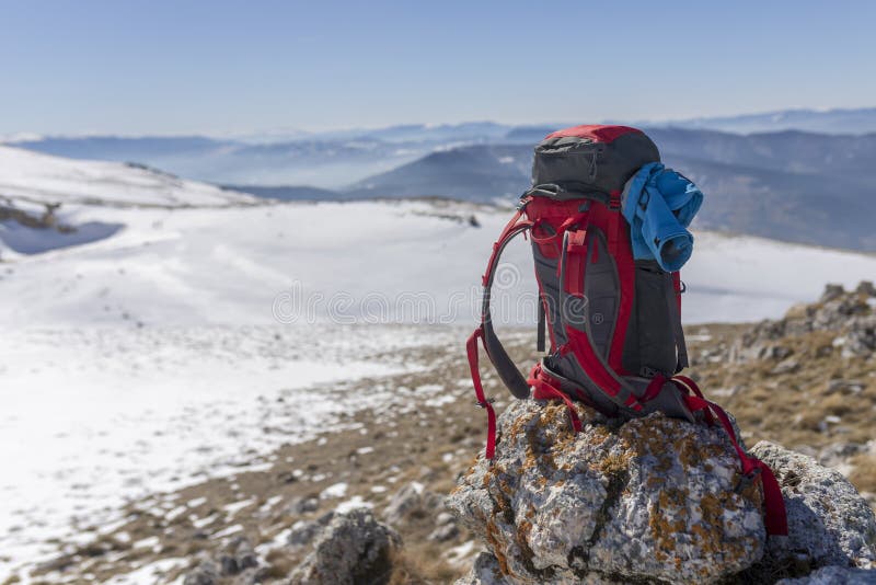 Back View of a Hiker Looking at the View from a Snowy Mountain Peak ...